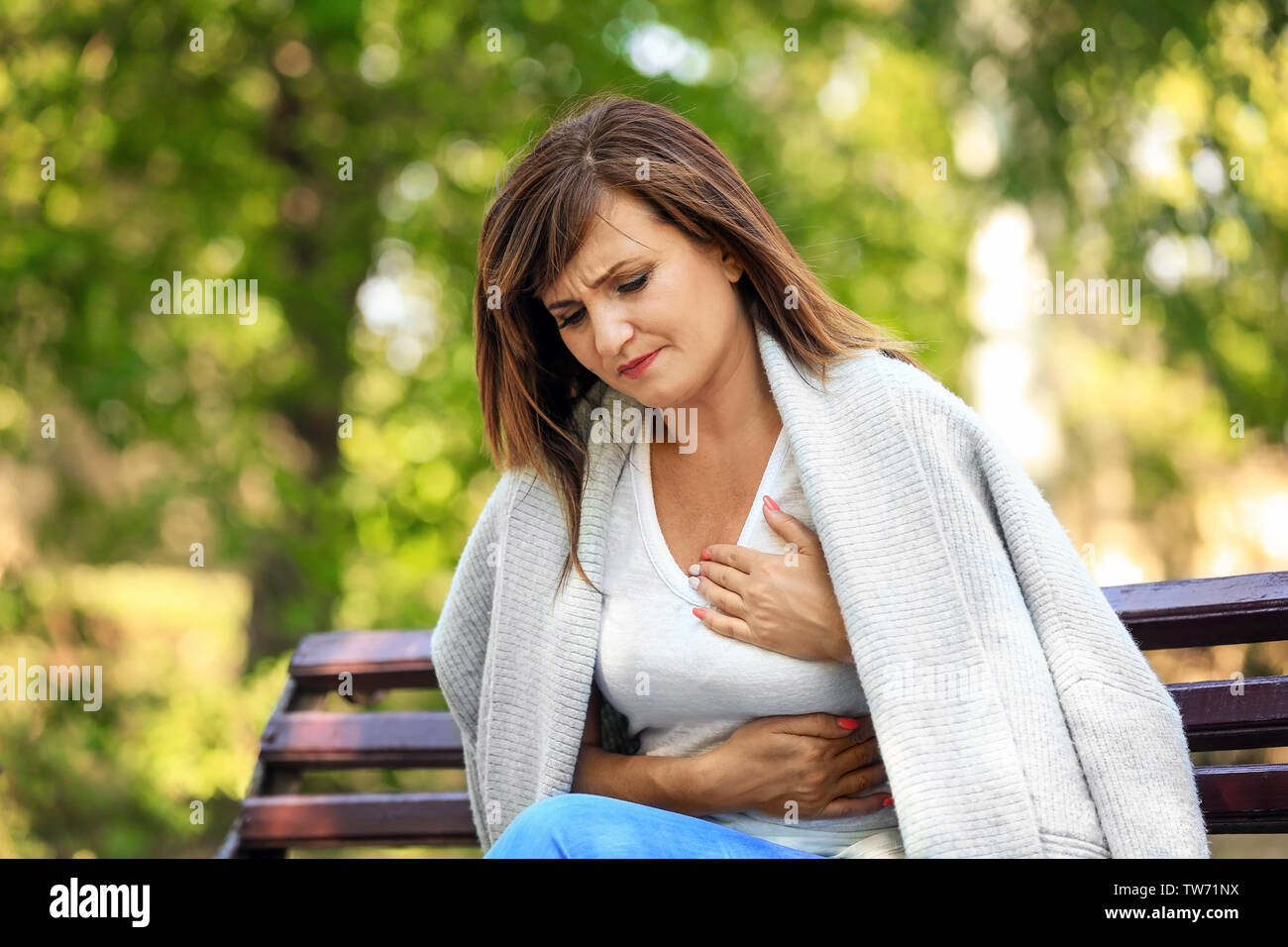 Heartache mature hi-res stock photography and images - Alamy
