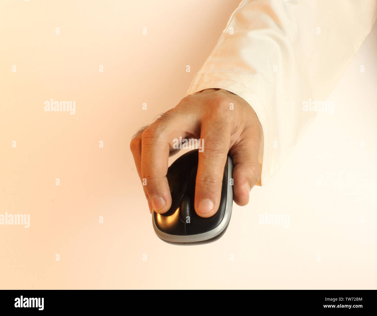 Arab Man wearing kandura Hand gesture series mouse computer technology ...