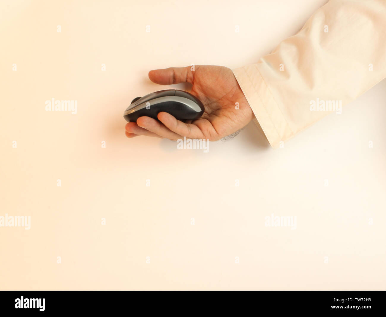 Arab Man wearing kandura Hand gesture series mouse computer technology ...