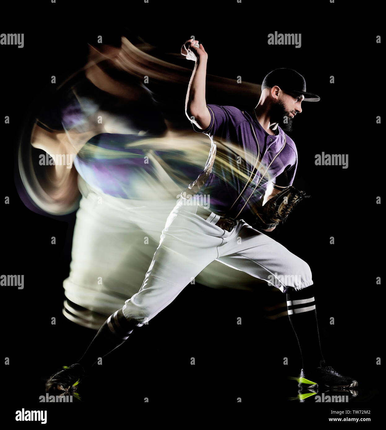 one caucasian baseball player man studio shot isolated on black ...