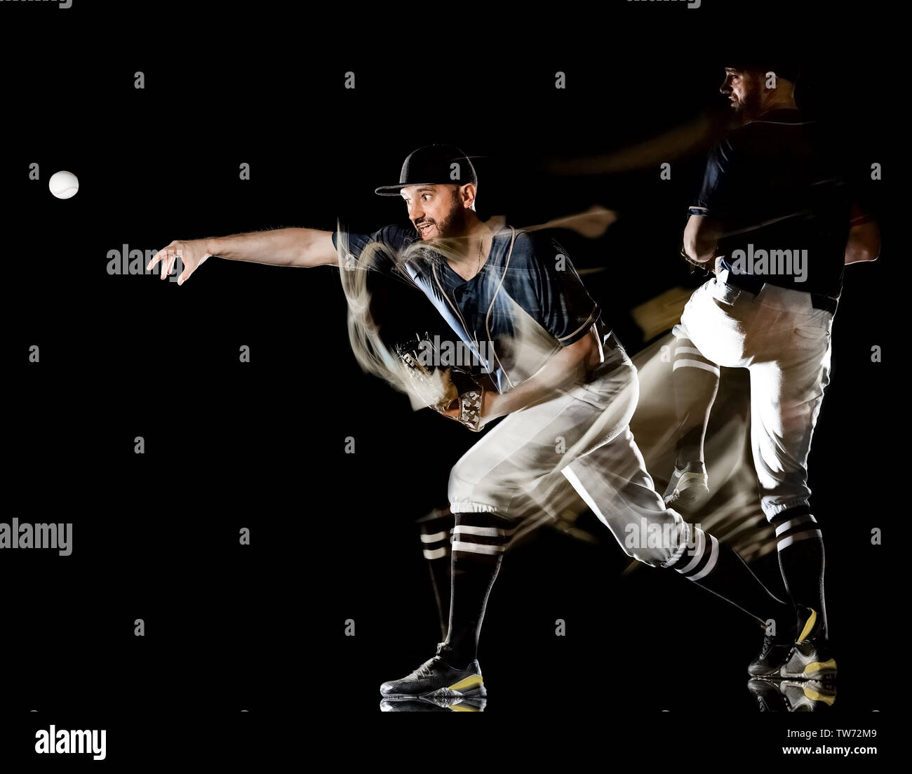 one caucasian baseball player man studio shot isolated on black ...