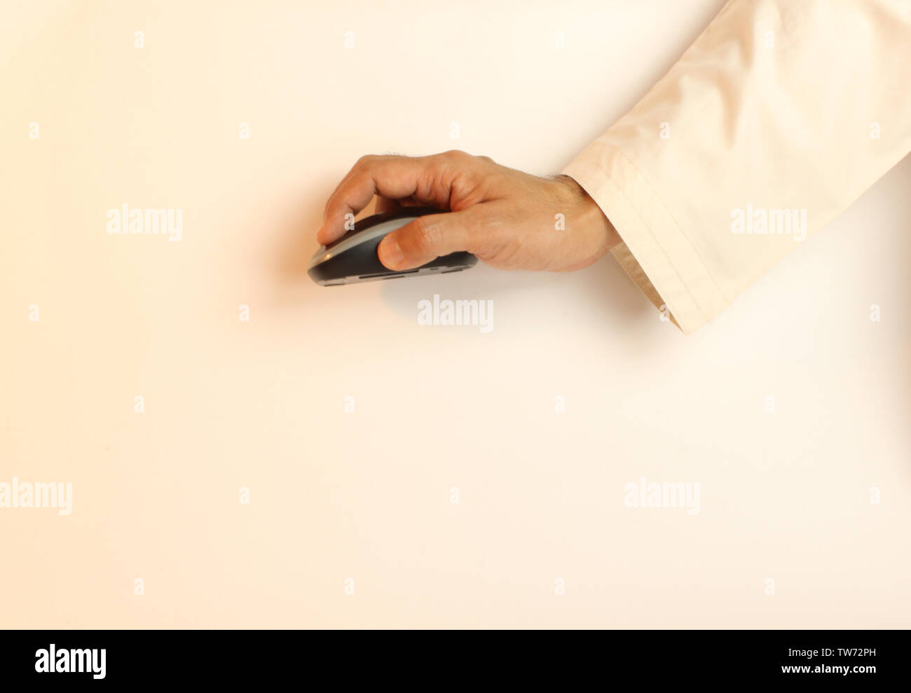 Arab Man wearing kandura Hand gesture series mouse computer technology ...