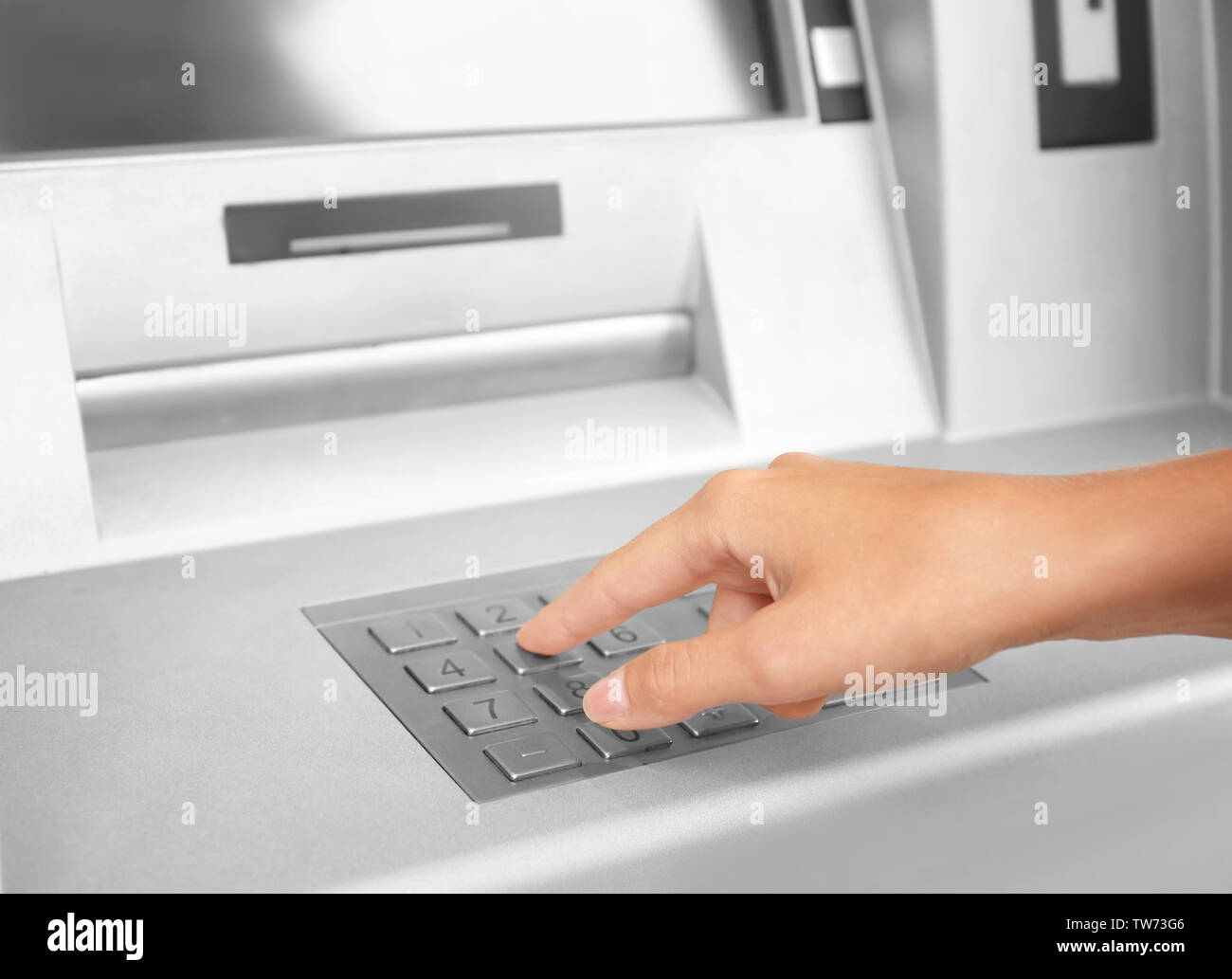 Entering pin cash machine hi-res stock photography and images - Alamy