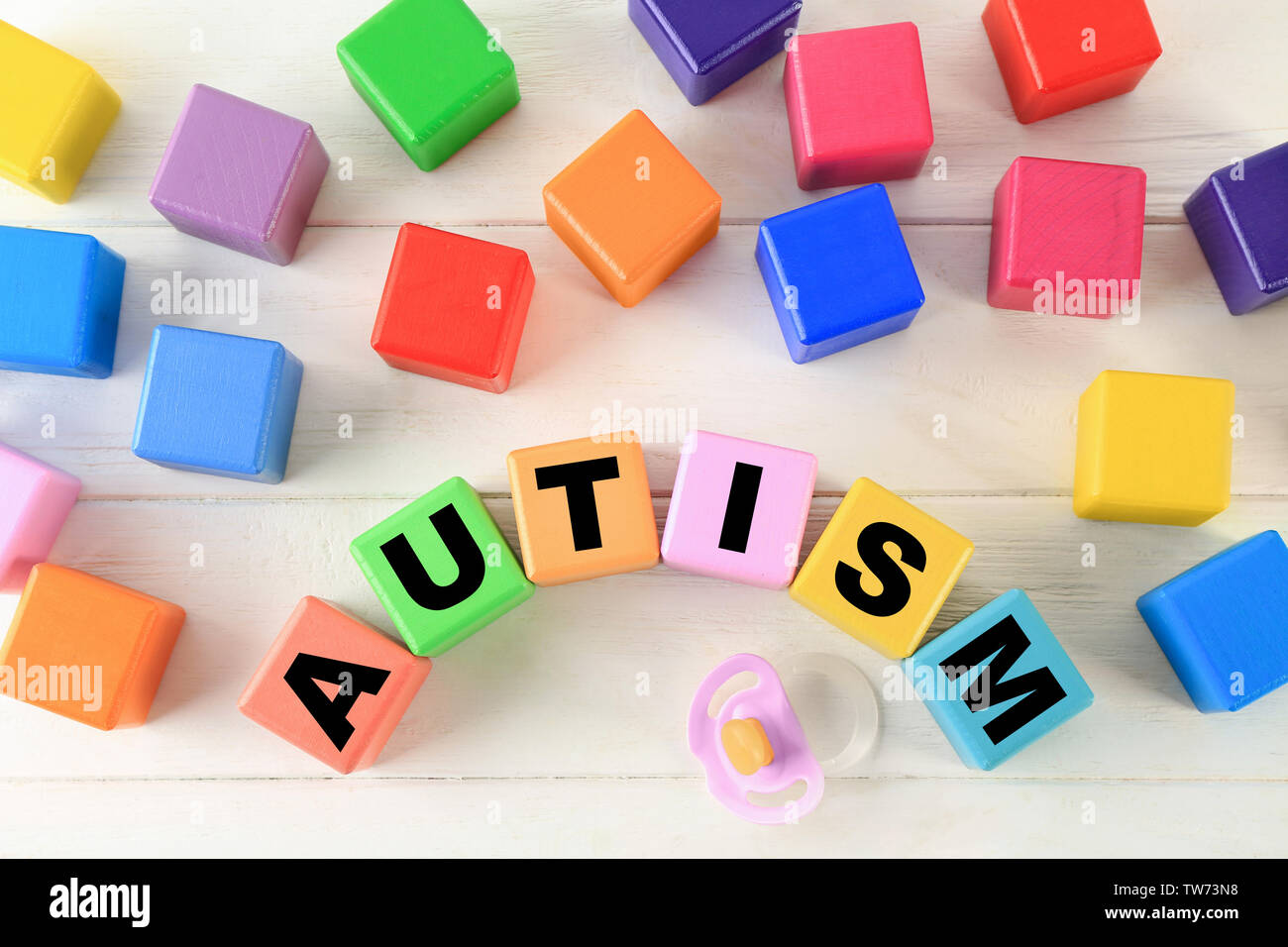 Child cubes word autism hi-res stock photography and images - Alamy