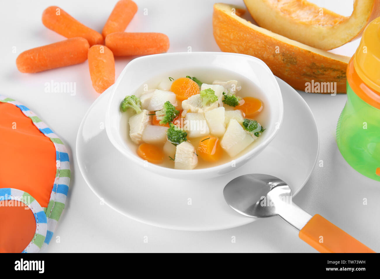 Plate of delicious baby soup on table Stock Photo - Alamy