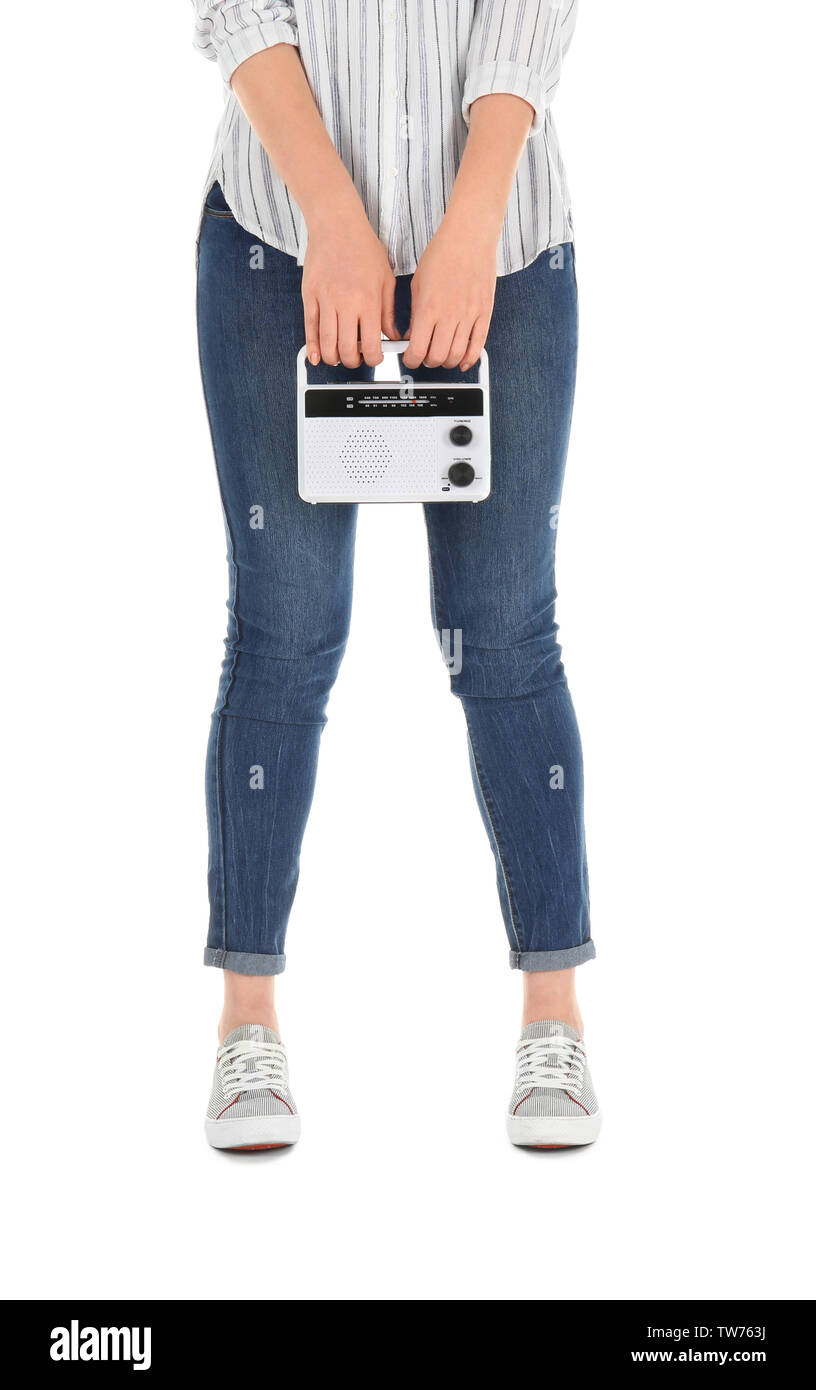 Woman holding radio on white background Stock Photo - Alamy