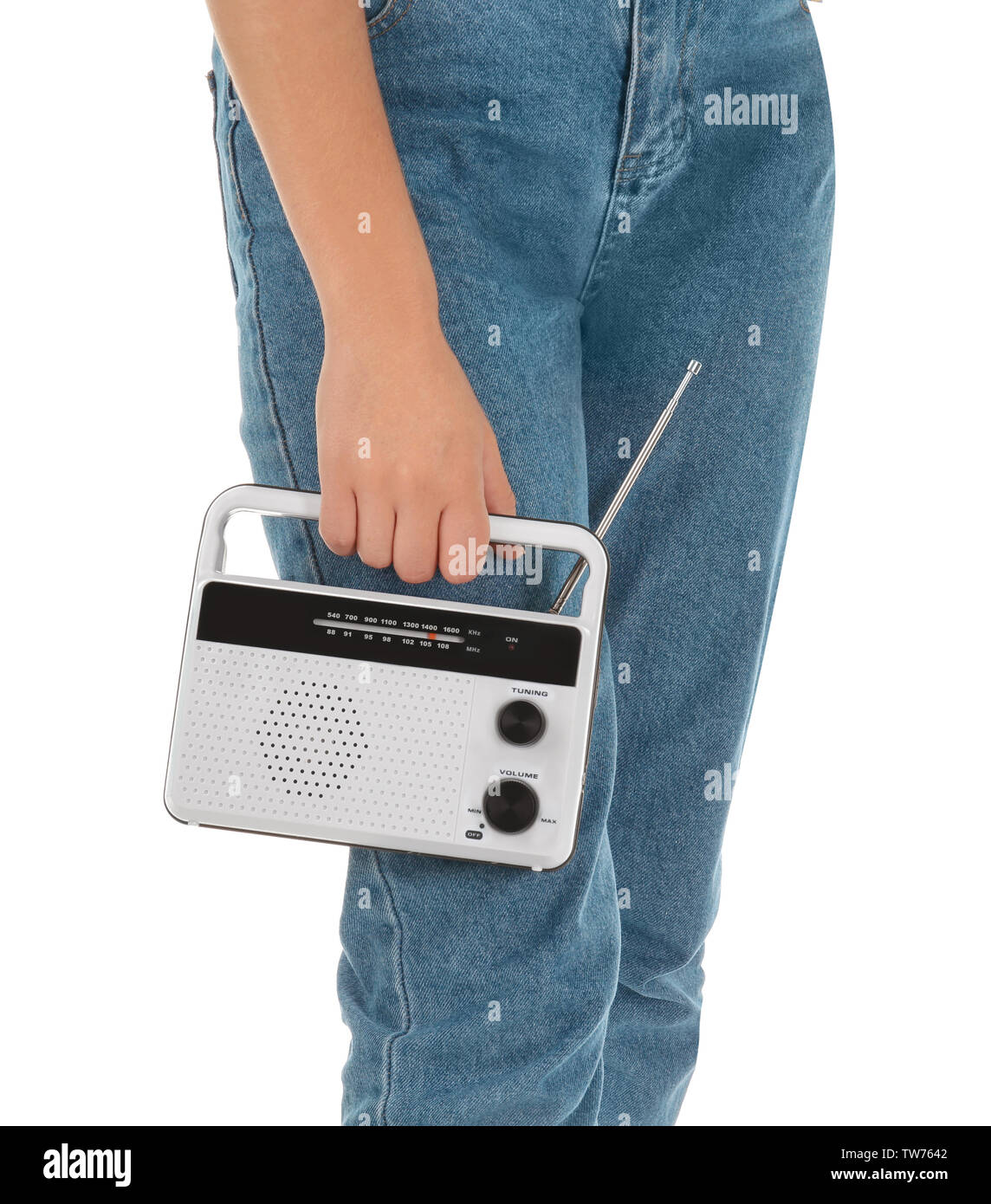 Woman holding radio on white background Stock Photo - Alamy