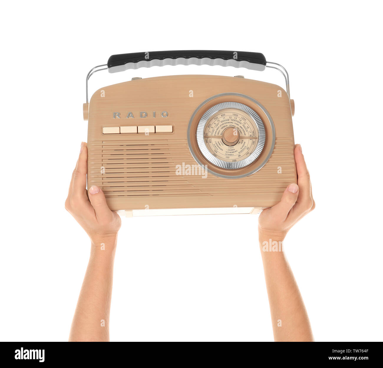 Woman holding radio on white background Stock Photo - Alamy