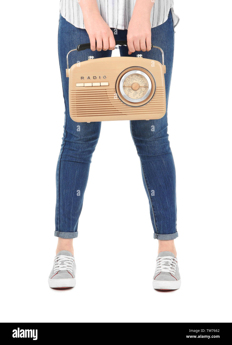 Woman holding radio on white background Stock Photo - Alamy