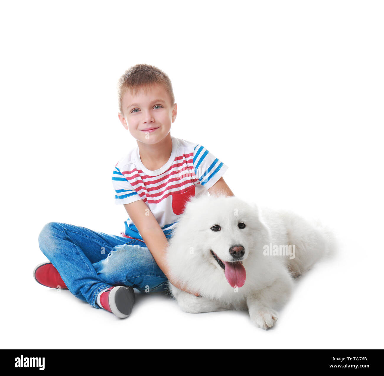 Cute little boy with dog on white background Stock Photo - Alamy