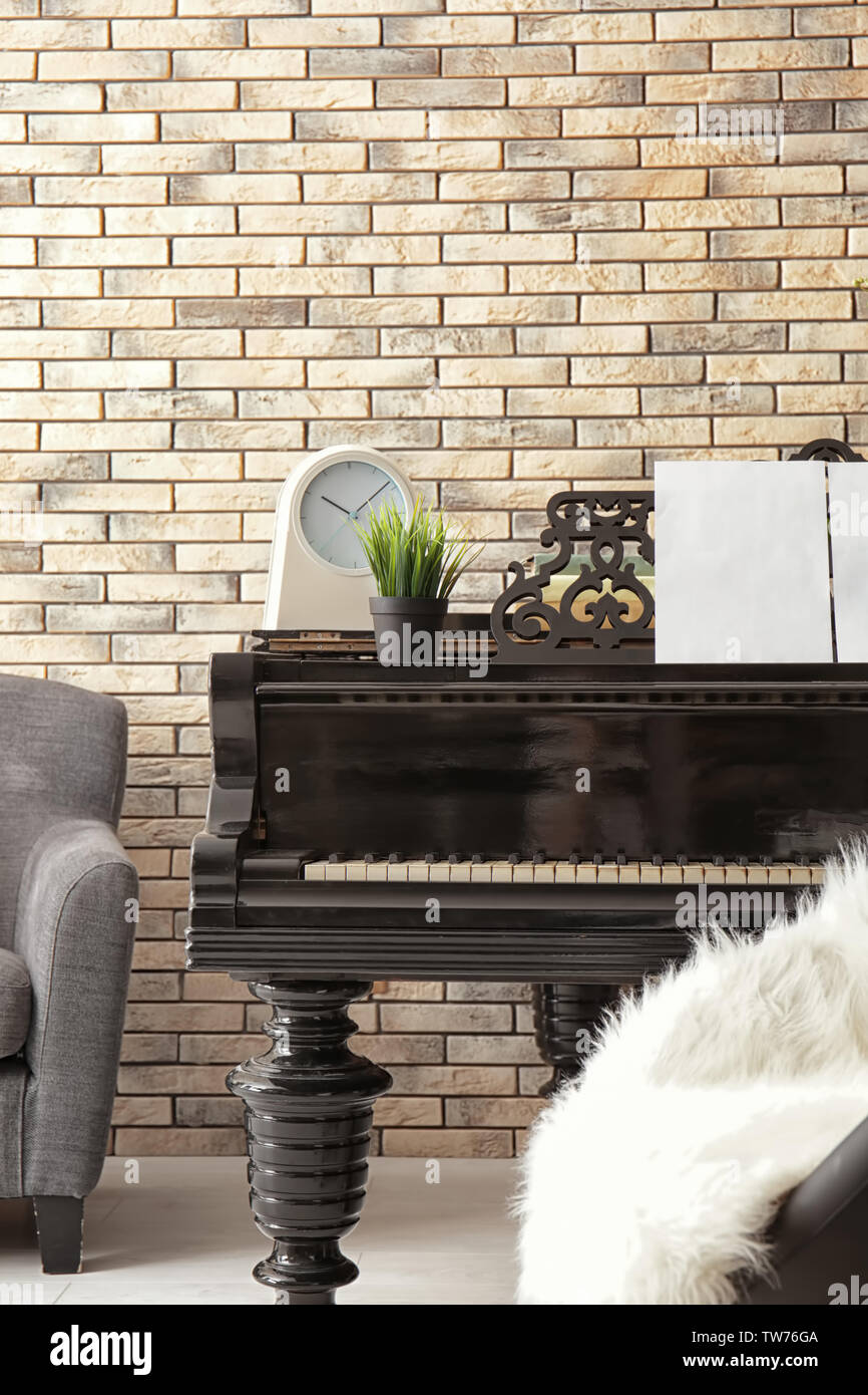 Grand piano in cozy home interior Stock Photo - Alamy