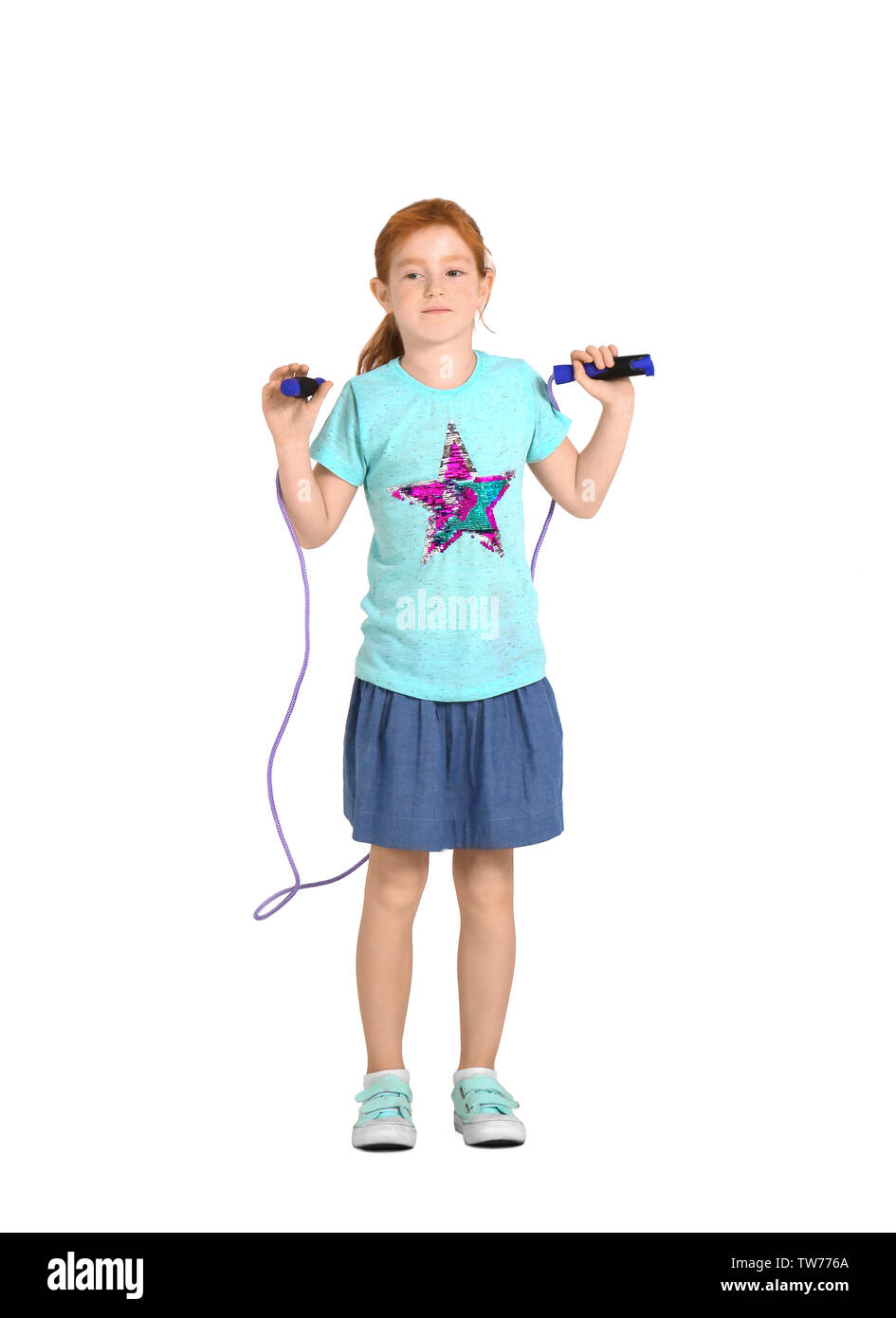 Cute little girl with jumping rope on white background Stock Photo - Alamy