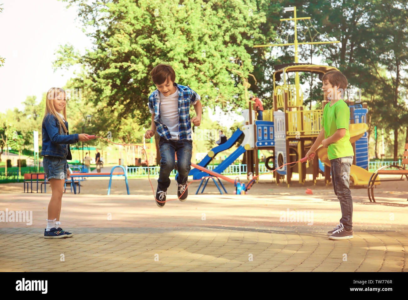 Kids jumping rope playground hi-res stock photography and images - Alamy