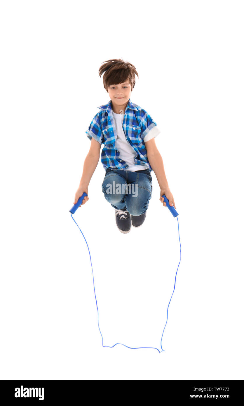 Cute little boy jumping rope on white background Stock Photo - Alamy