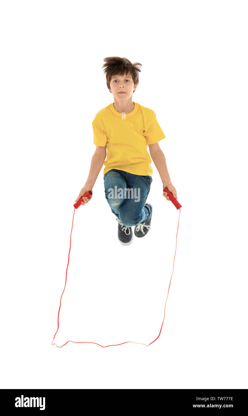 Cute little boy jumping rope on white background Stock Photo - Alamy
