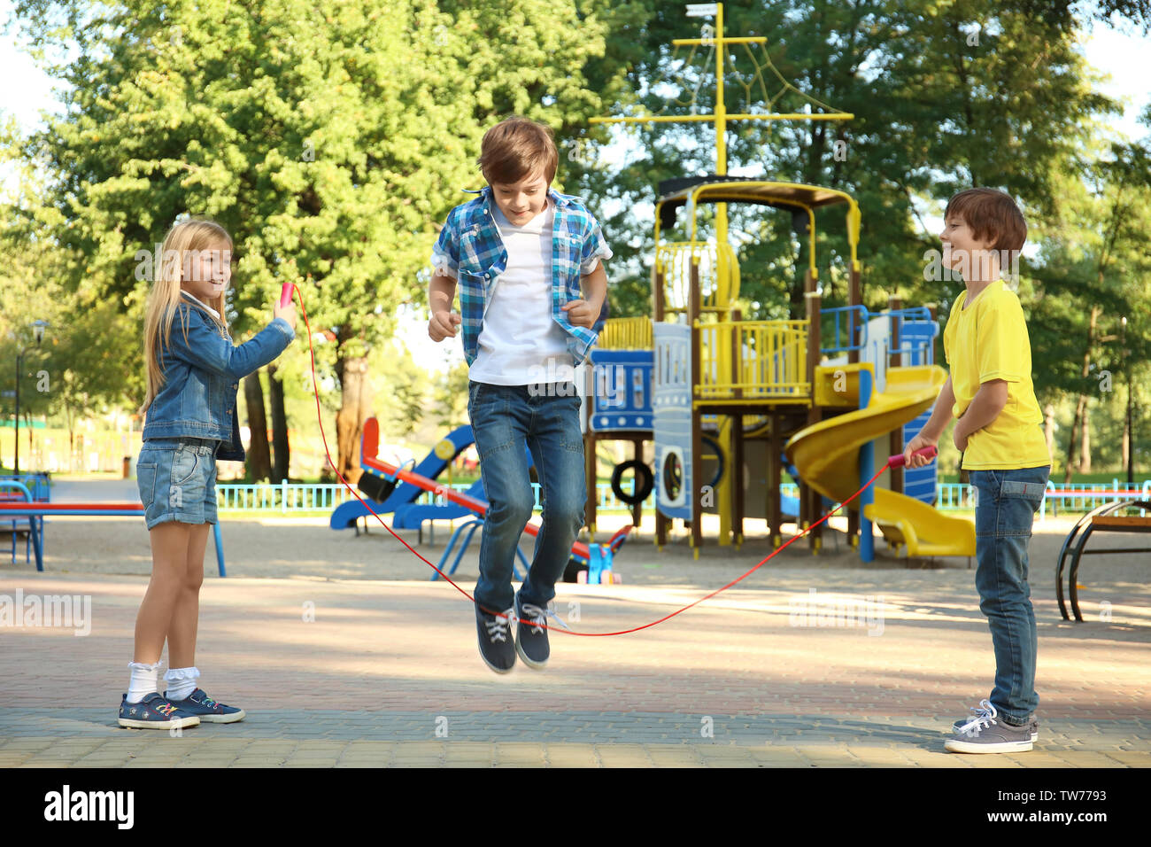 Kids jumping rope playground hi-res stock photography and images - Alamy