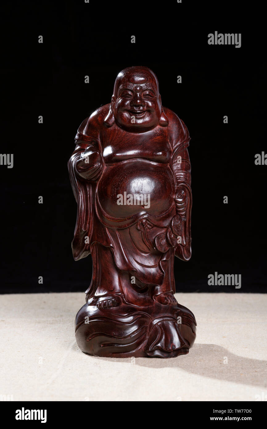 Maitreya wood carving hi-res stock photography and images - Alamy