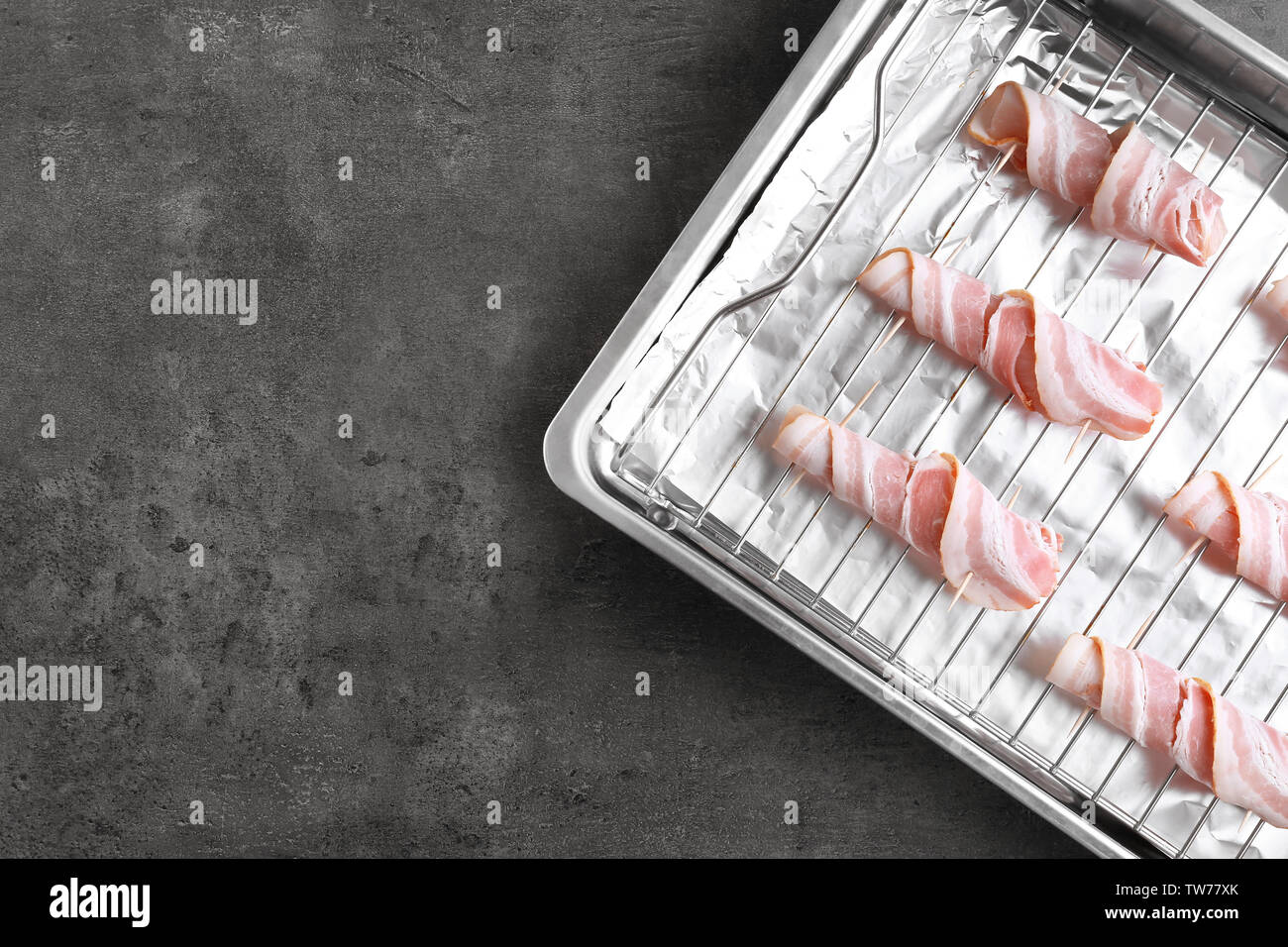 Bacon wrapped chicken nuggets on baking rack Stock Photo - Alamy