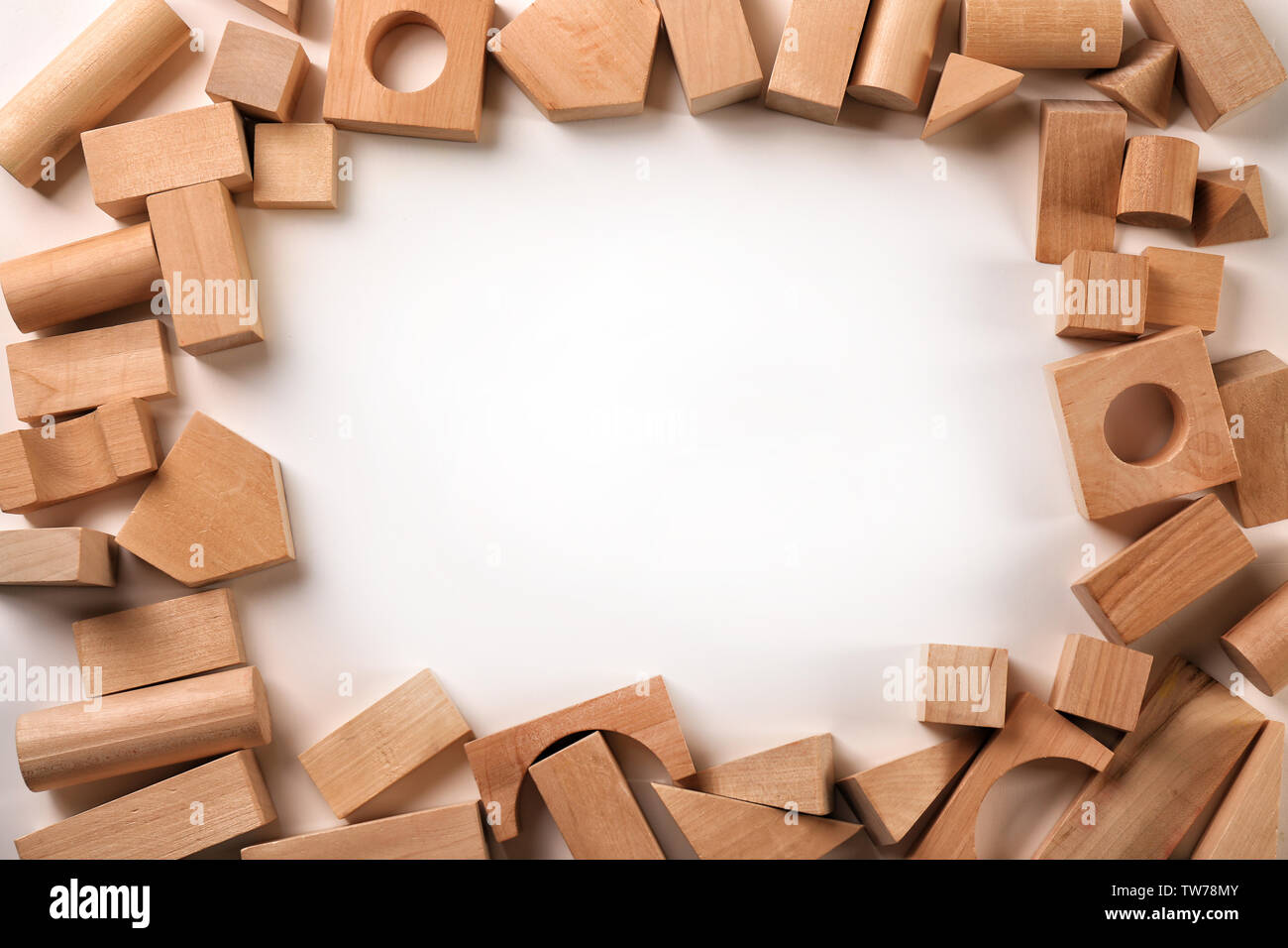 Wooden blocks for kindergarten on white background Stock Photo - Alamy