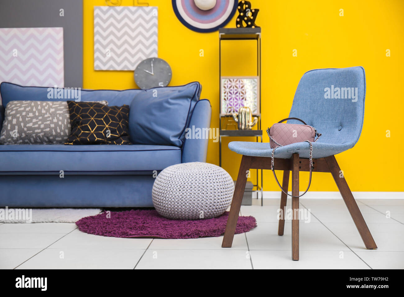 Modern interior with comfortable chair and sofa Stock Photo - Alamy