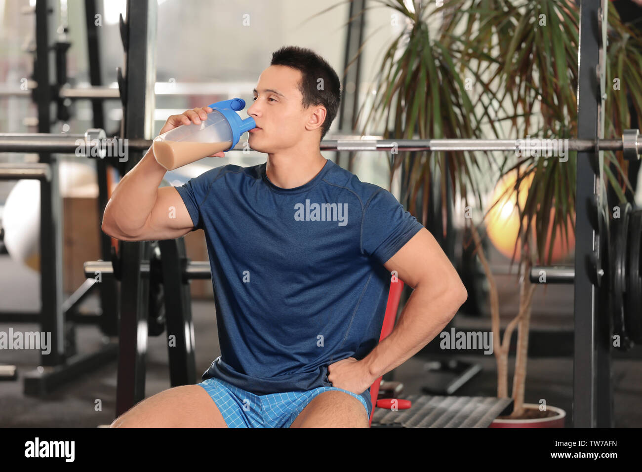 Man drinking protein in gym hi-res stock photography and images - Alamy