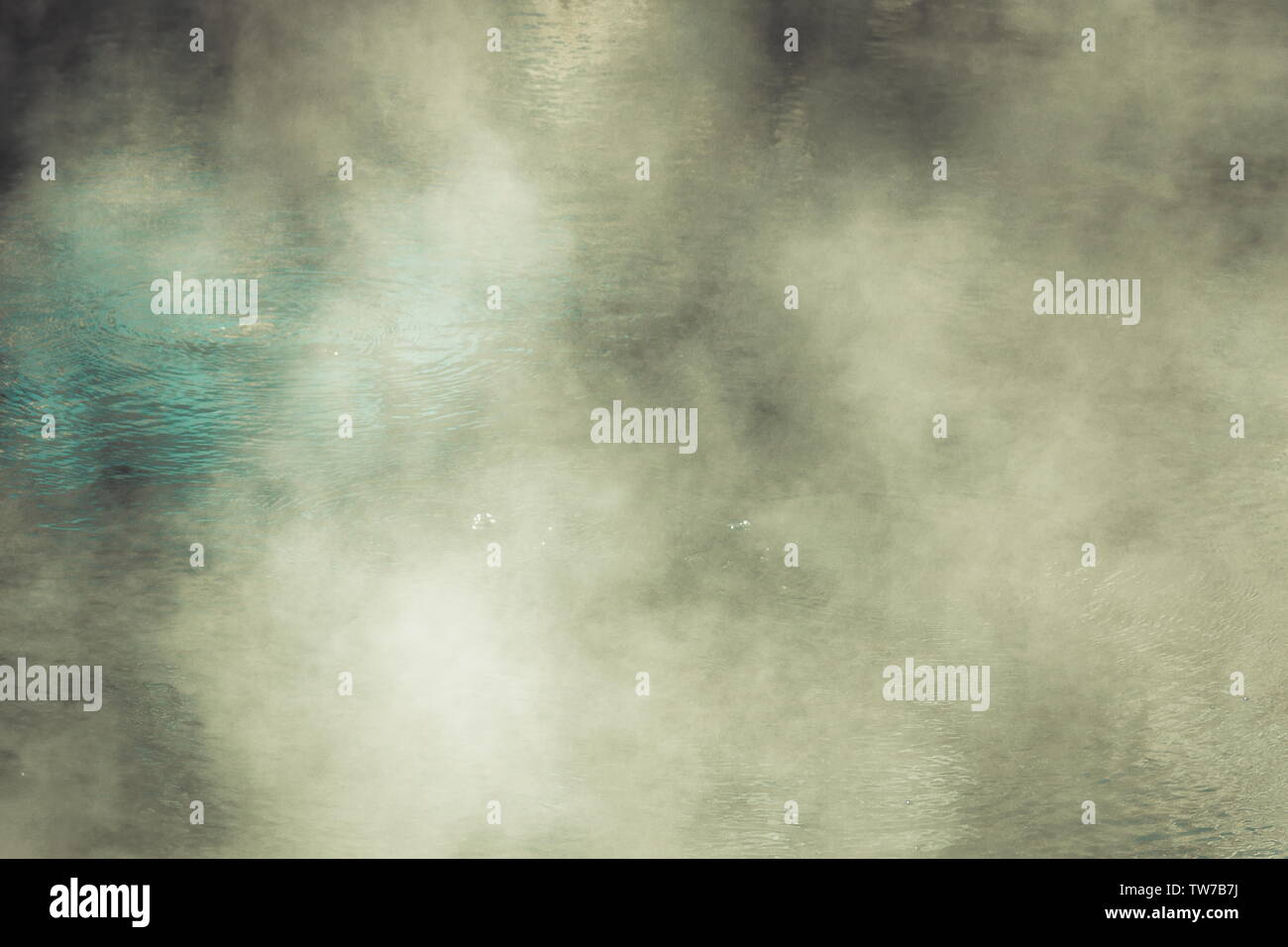 Background image of steam rising above a hot water thermal pool Stock ...