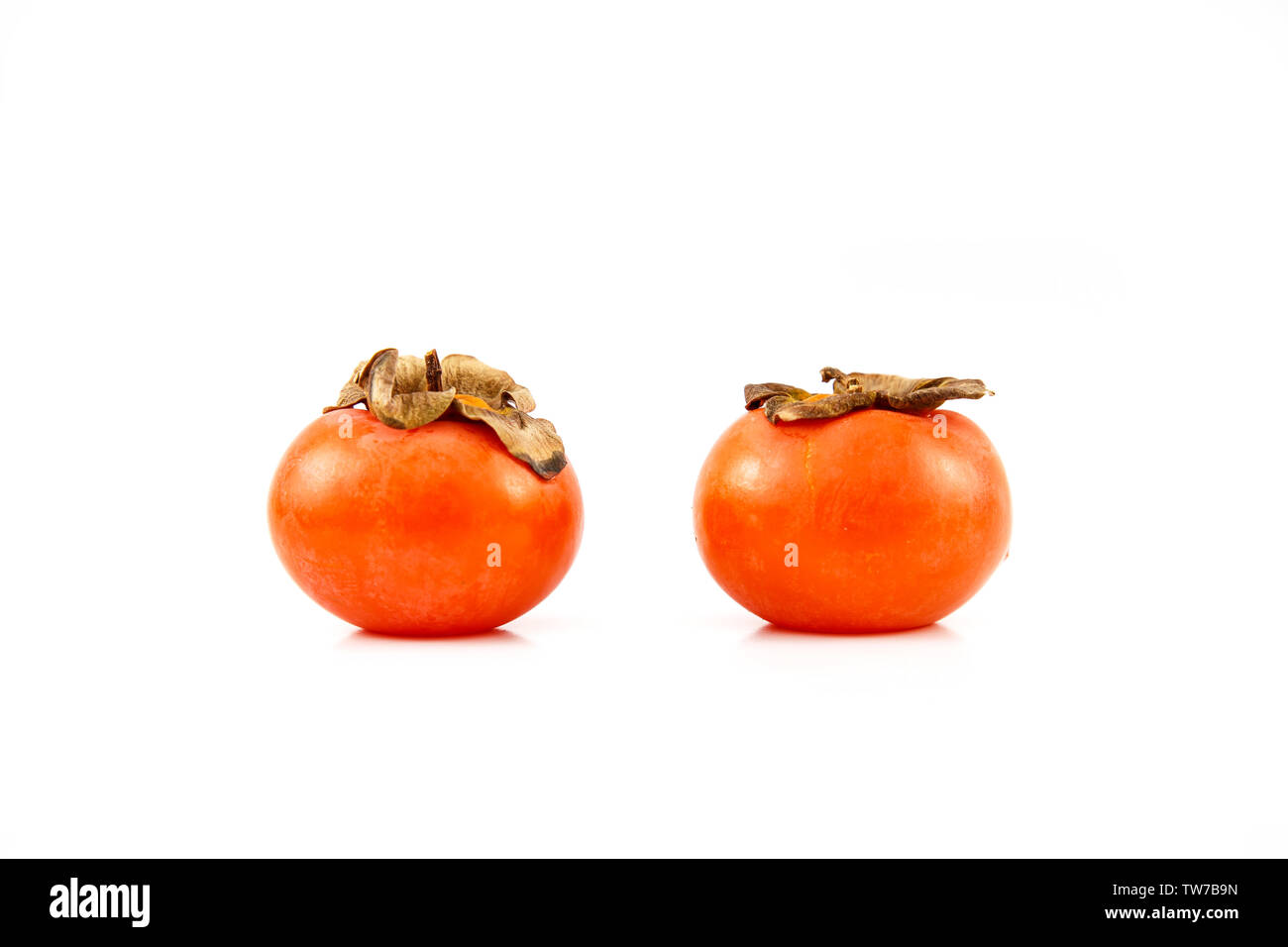Photographed persimmon in white background Stock Photo - Alamy