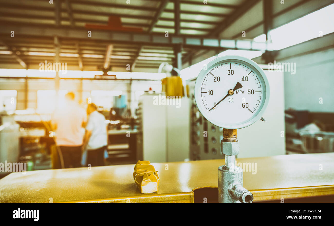 Pressure valve on factory equipment Stock Photo - Alamy