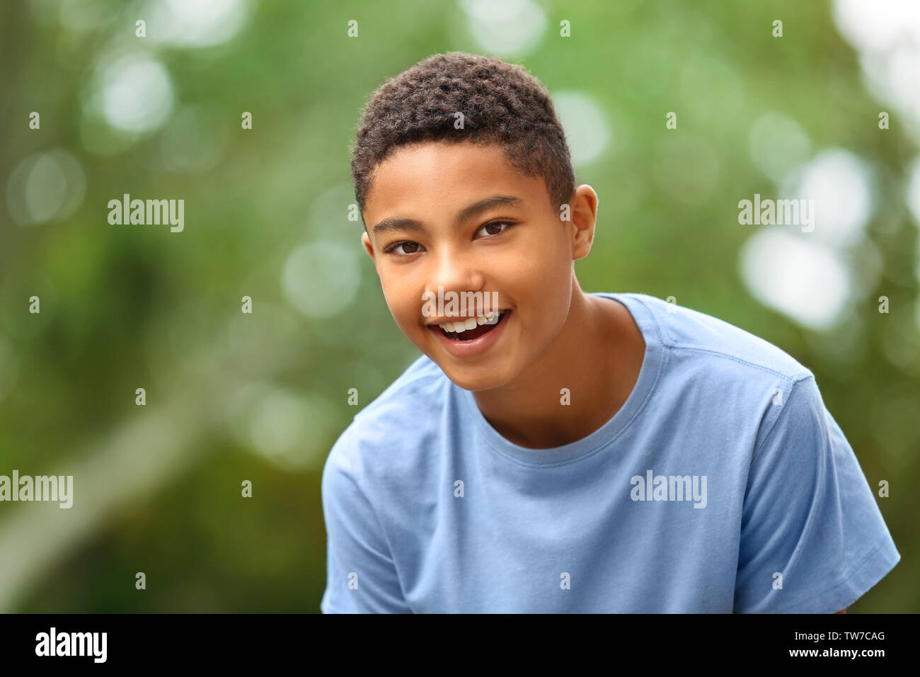 Charming African-American teenager outdoors Stock Photo - Alamy