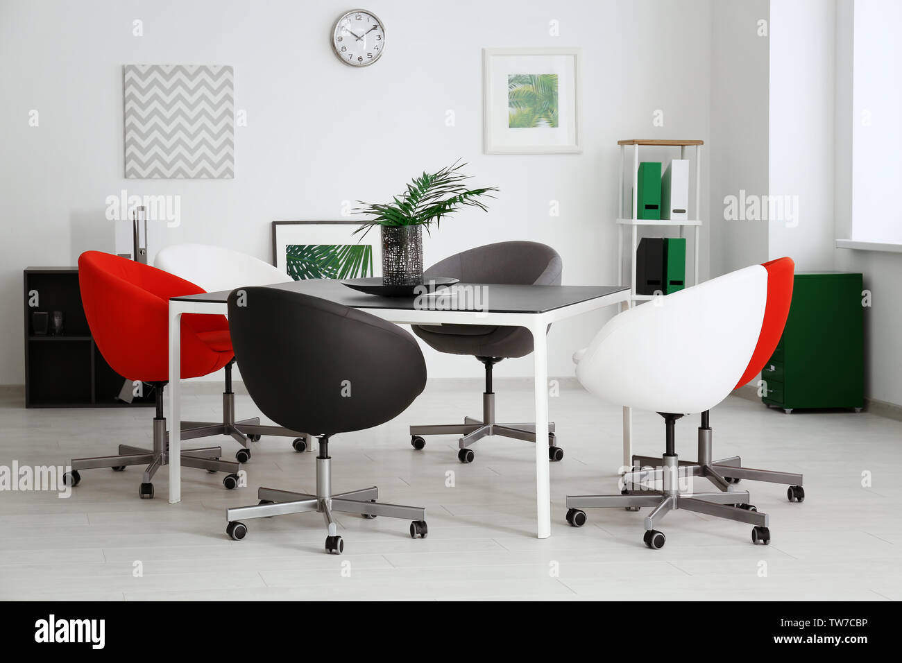 Modern room interior with big table and chairs Stock Photo - Alamy