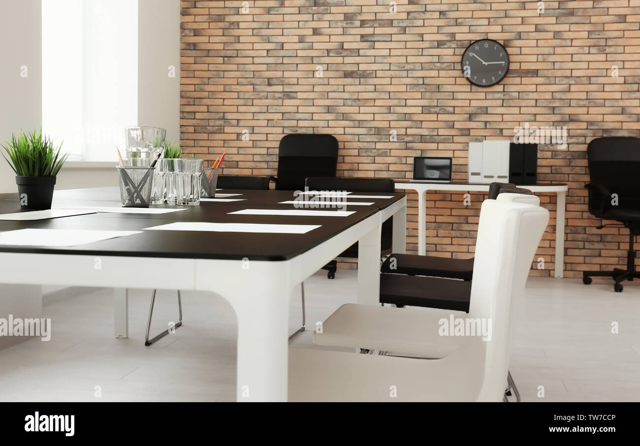 Modern room interior with big table and chairs Stock Photo - Alamy