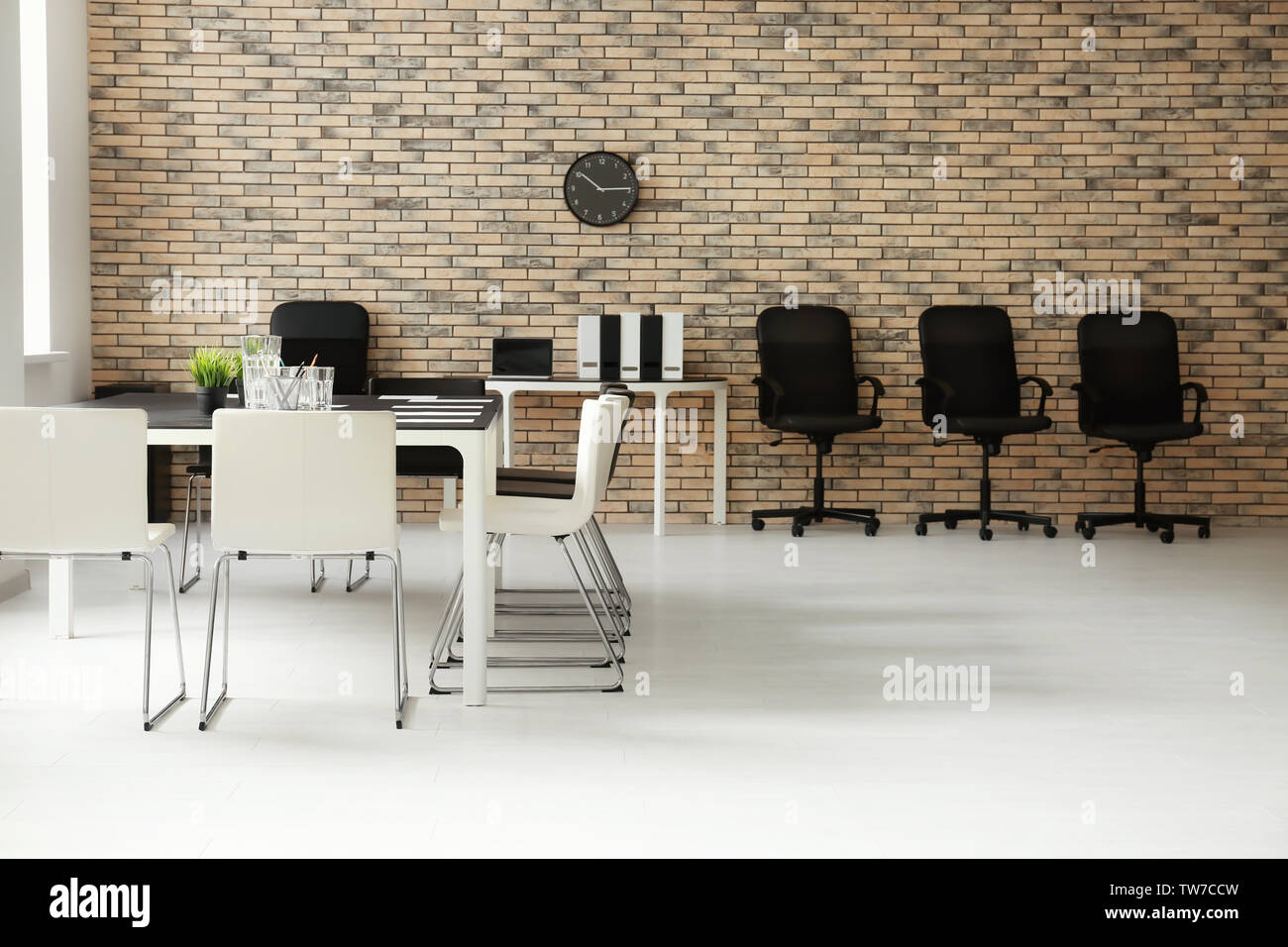Modern room interior with big table and chairs Stock Photo - Alamy