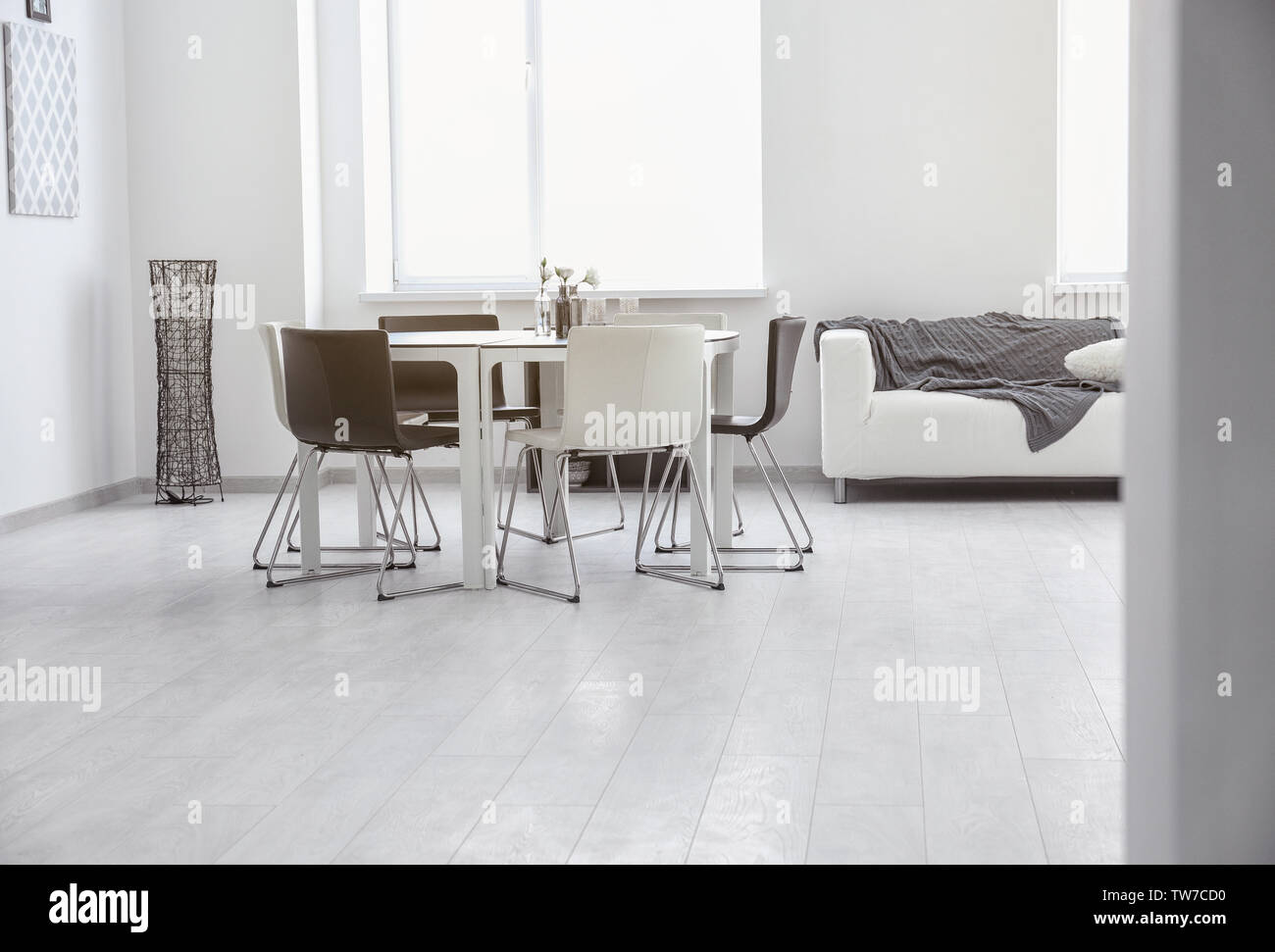 Modern room interior with big table and chairs Stock Photo - Alamy