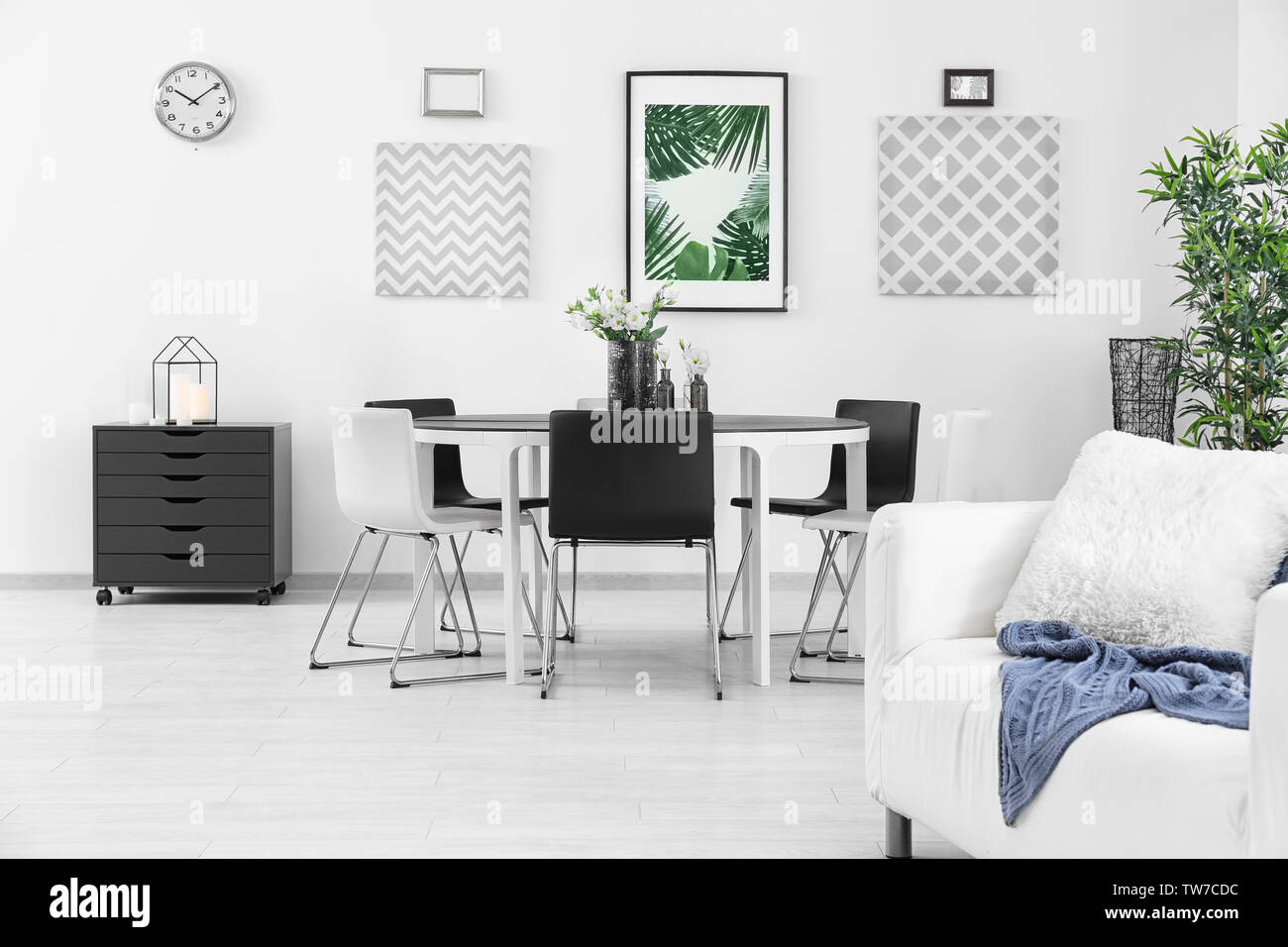 Modern room interior with big table and chairs Stock Photo - Alamy