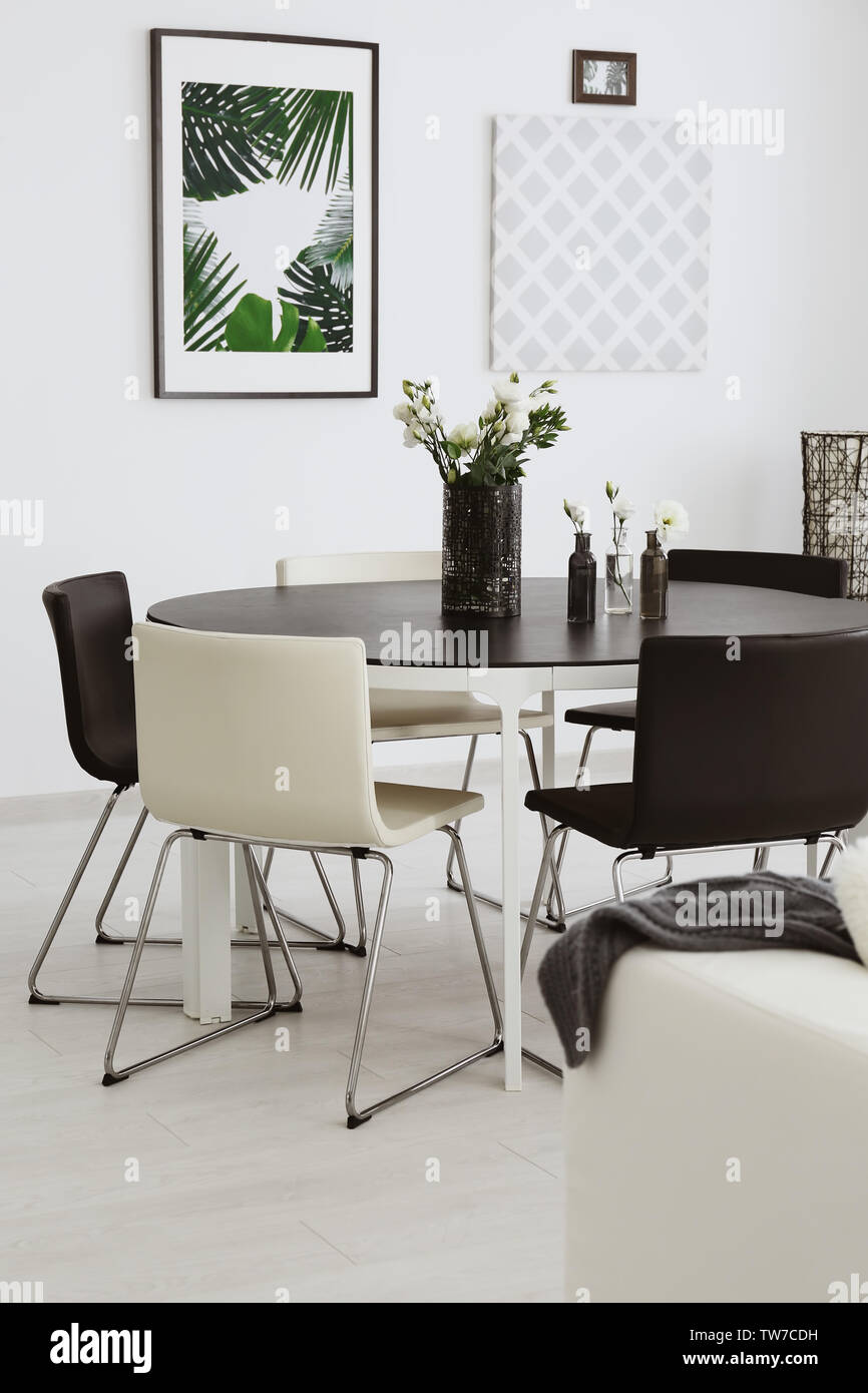 Modern room interior with big table and chairs Stock Photo - Alamy
