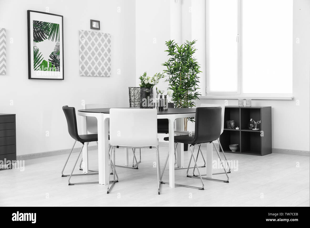 Modern room interior with big table and chairs Stock Photo - Alamy
