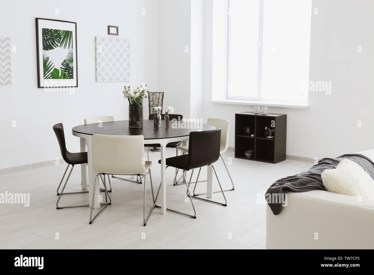 Modern room interior with big table and chairs Stock Photo - Alamy