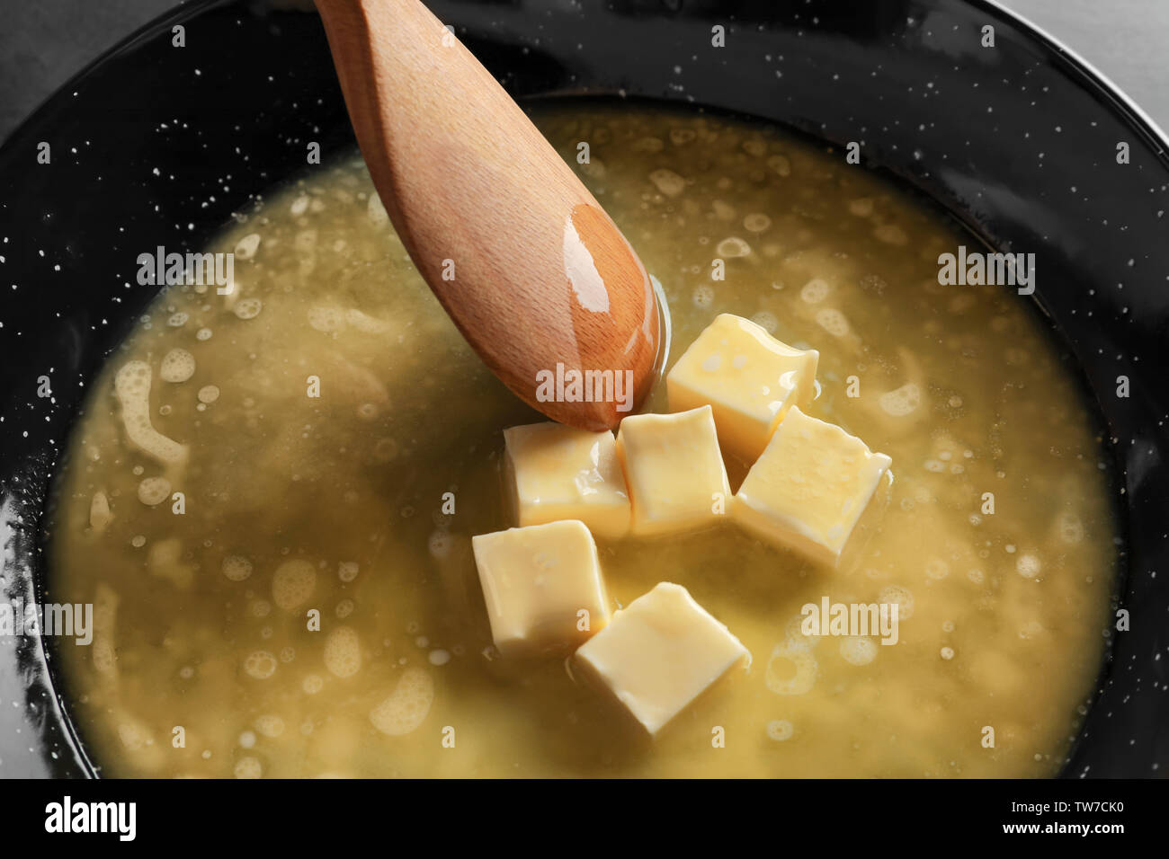 Cooking melting butter on pan hi-res stock photography and images - Alamy