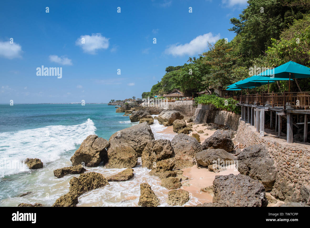 Bali blue sky and white clouds under Indian Ocean resort hotel waves ...