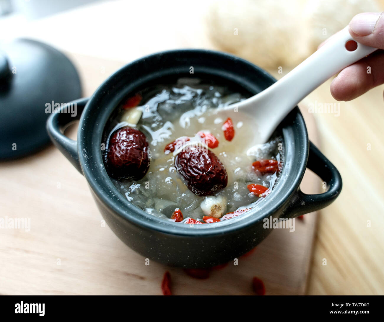 Red jujube silver ear lotus seed soup Stock Photo - Alamy