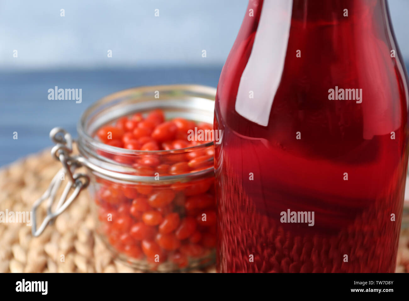 Bottle with goji juice, closeup Stock Photo - Alamy