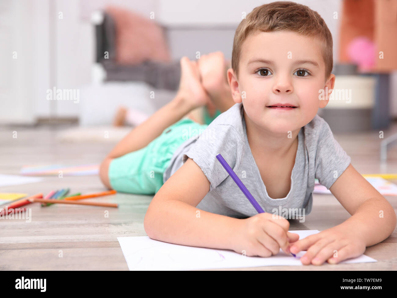 Cute little boy drawing at home Stock Photo - Alamy