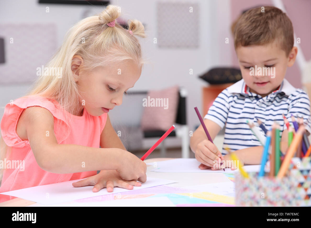 Cute little children drawing at home Stock Photo - Alamy