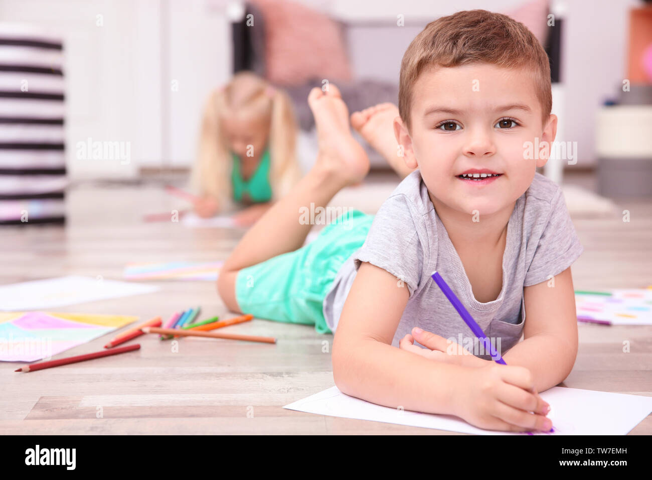 Cute little boy drawing at home Stock Photo - Alamy