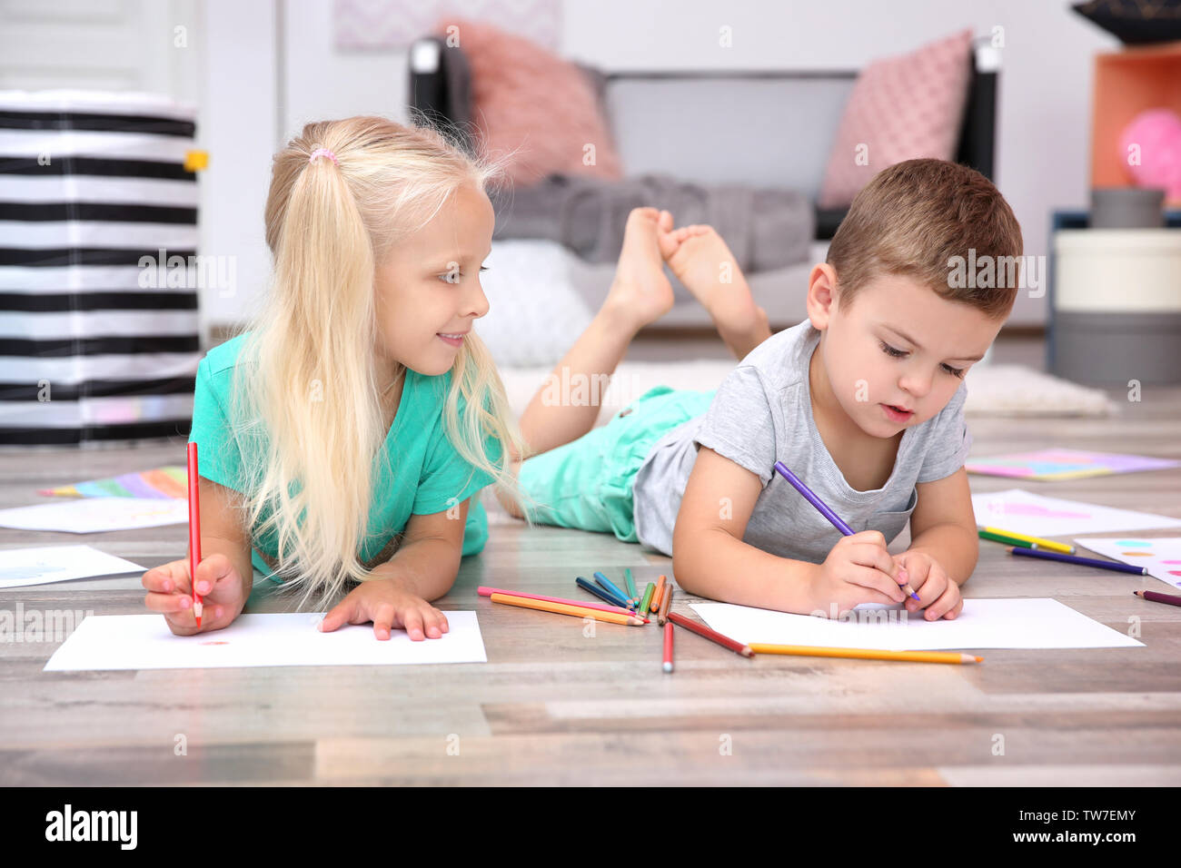 Cute little children drawing at home Stock Photo - Alamy