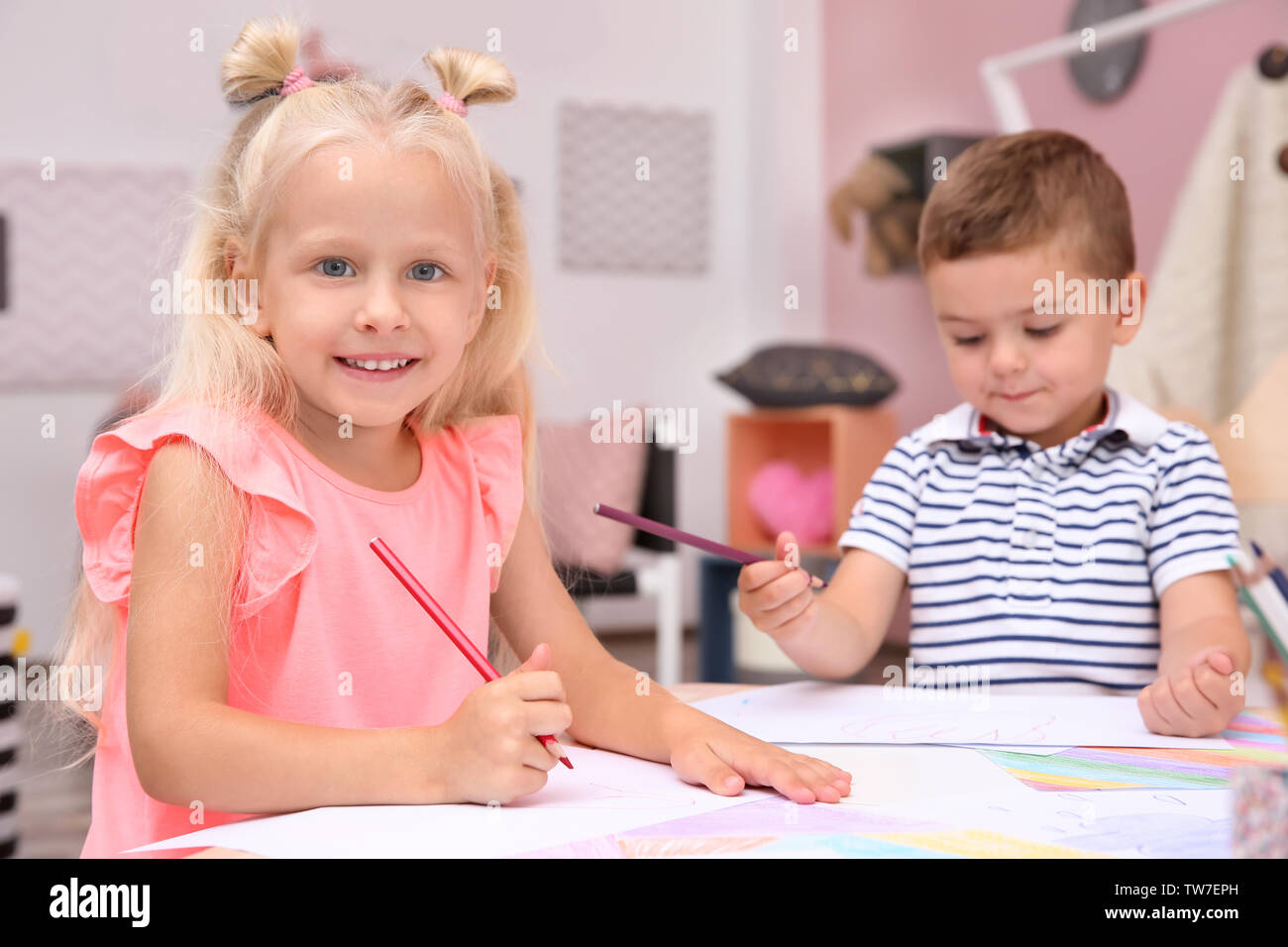 Cute little children drawing at home Stock Photo - Alamy