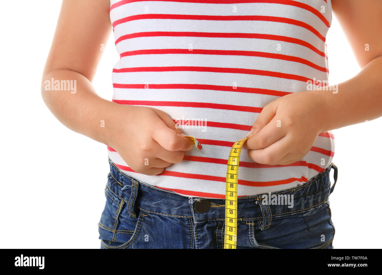 Overweight boy measuring waist on white background, closeup Stock Photo ...