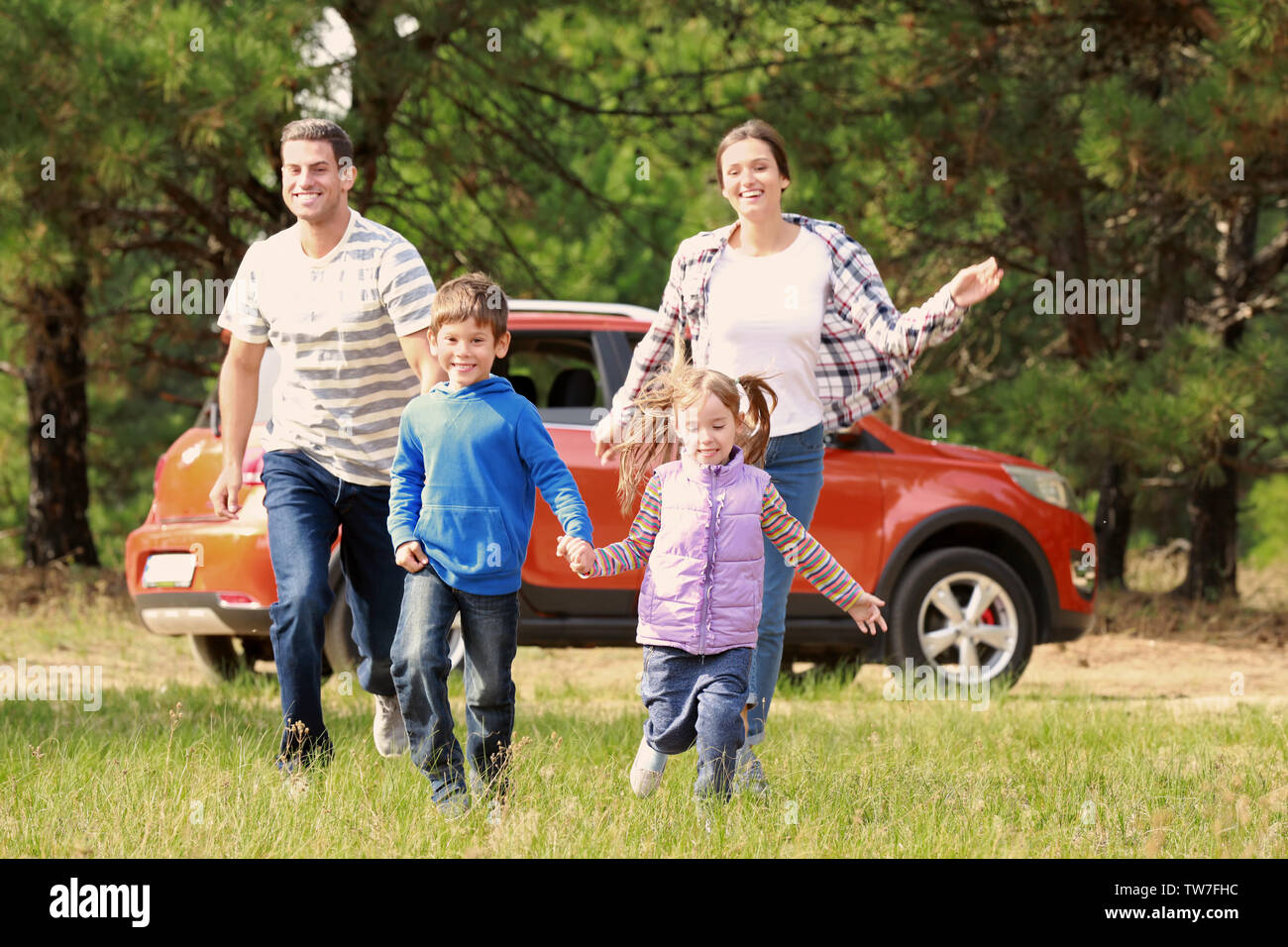 Happy family having fun outdoors Stock Photo - Alamy