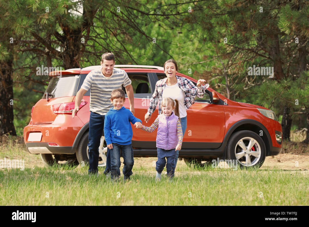 Happy family having fun outdoors Stock Photo - Alamy
