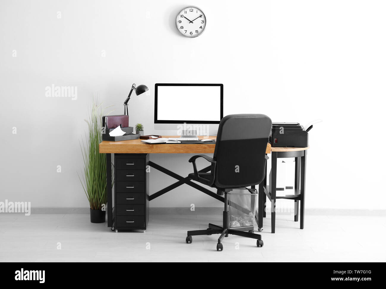Comfortable workplace with computer monitor on table in office Stock ...